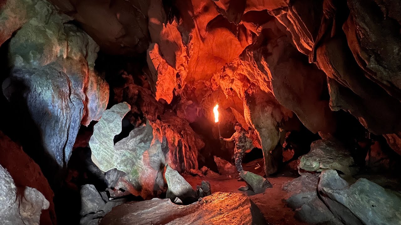 Take shelter from the rain in a beautiful rock cave - YouTube