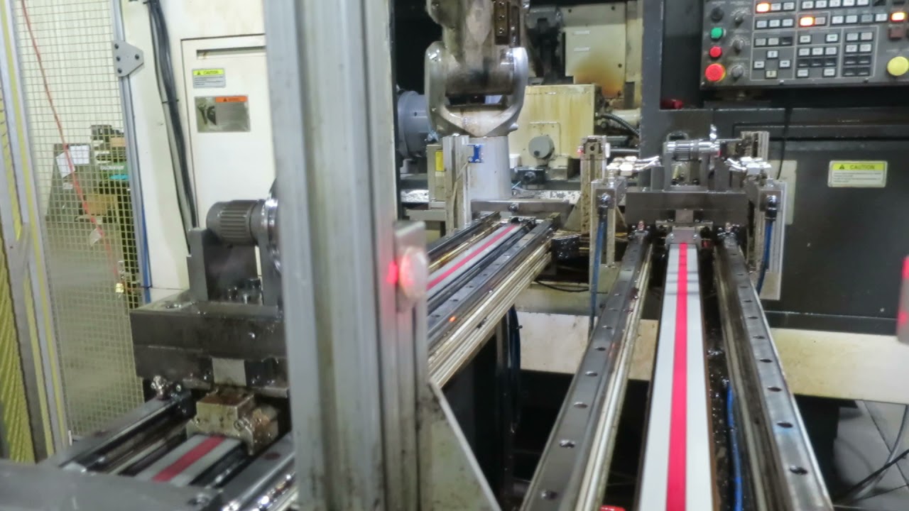 2014 Okuma GP26T II Cylindrical Grinder with Robot Loader - YouTube
