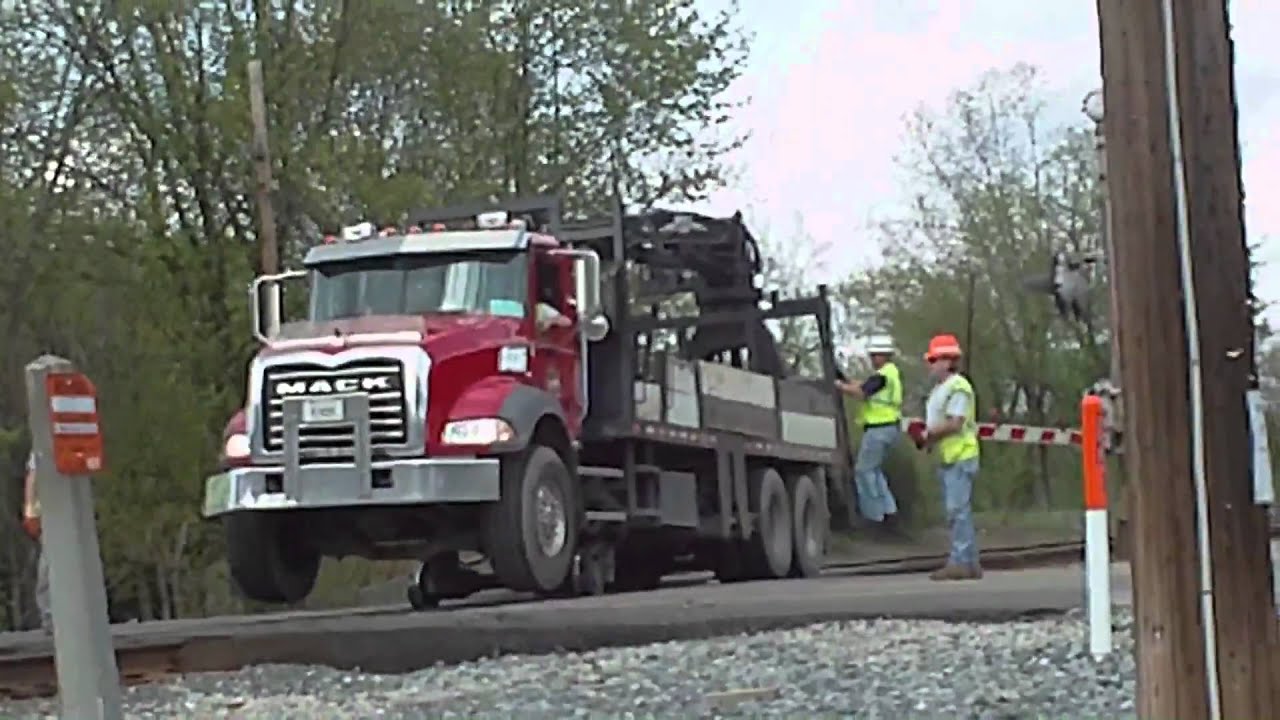How CSX gets their rail compatable cranes and trucks onto the tracks - YouTube
