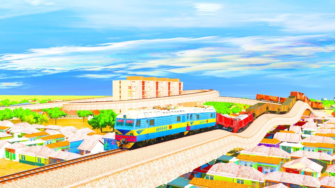 This Train Runs Through a Super Long Spiral Track that Loops to a Tall ...