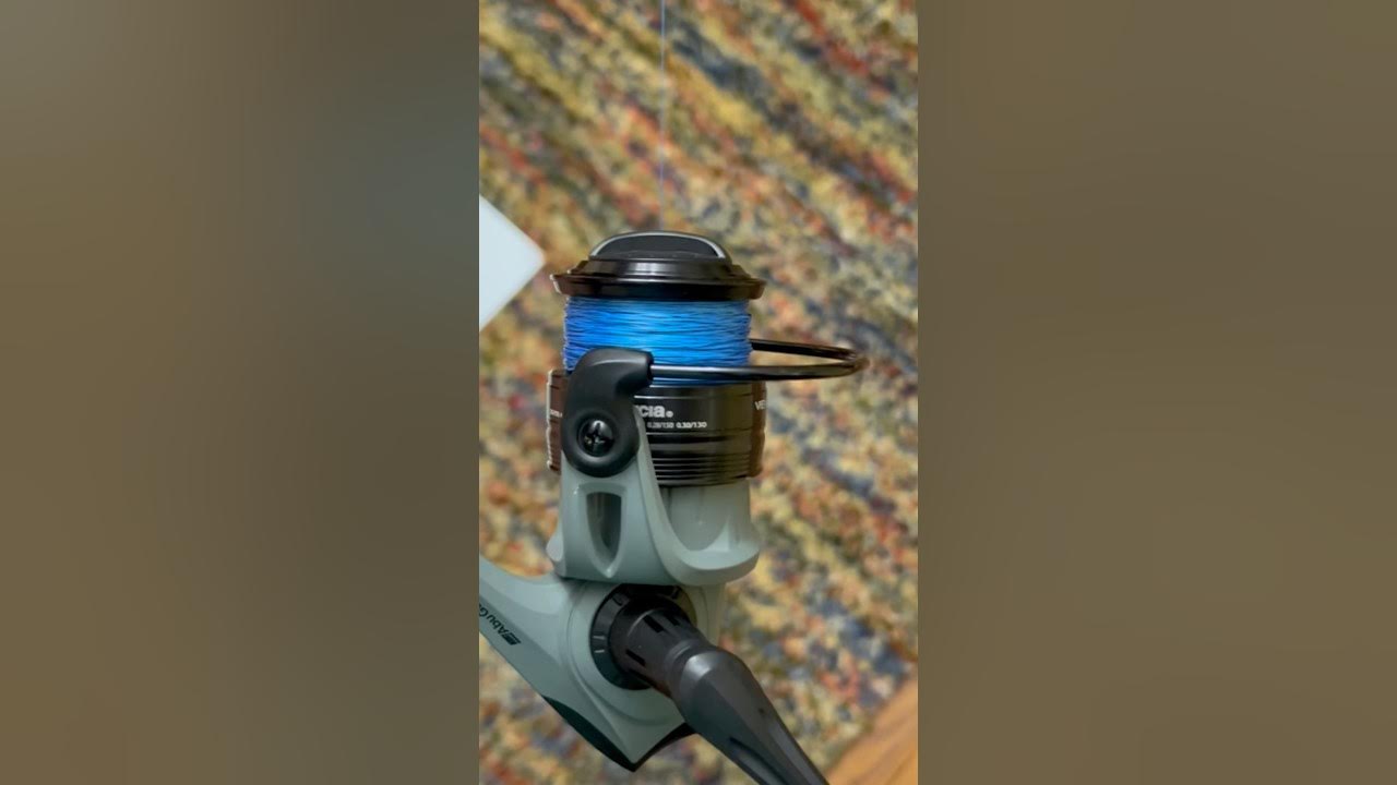 How to put new line on an open face fishing reel - YouTube