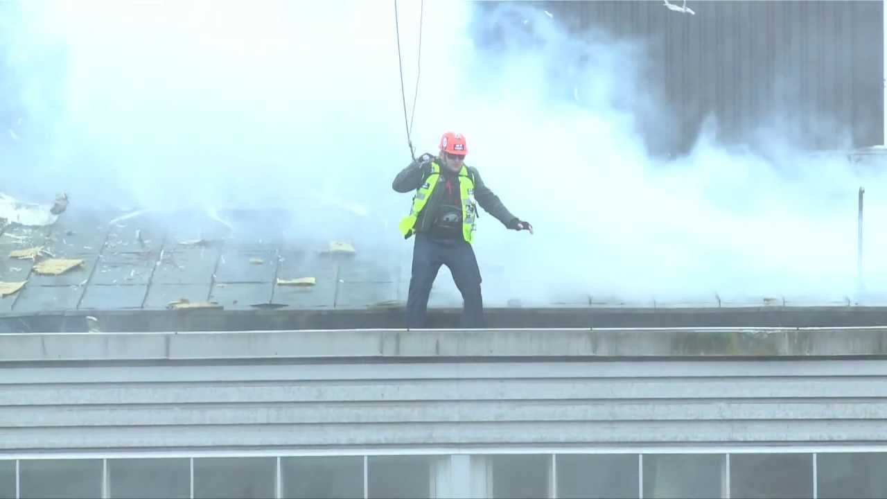 Demolition man FAIL - Standing on top of a detonating building - YouTube