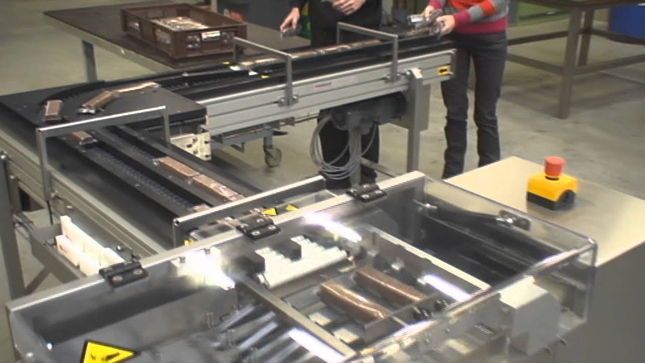 A-tec cartoner with Shuttleworth infeed - YouTube