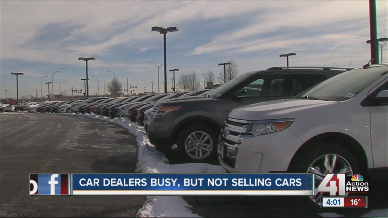 Car dealers busy, but not selling cars - YouTube