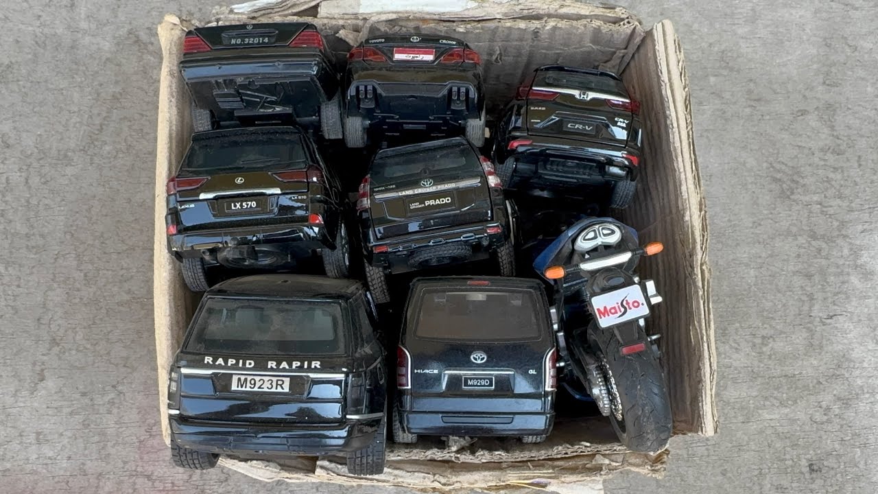 Find a box of black diecast model cars and bike collection - Box full ...