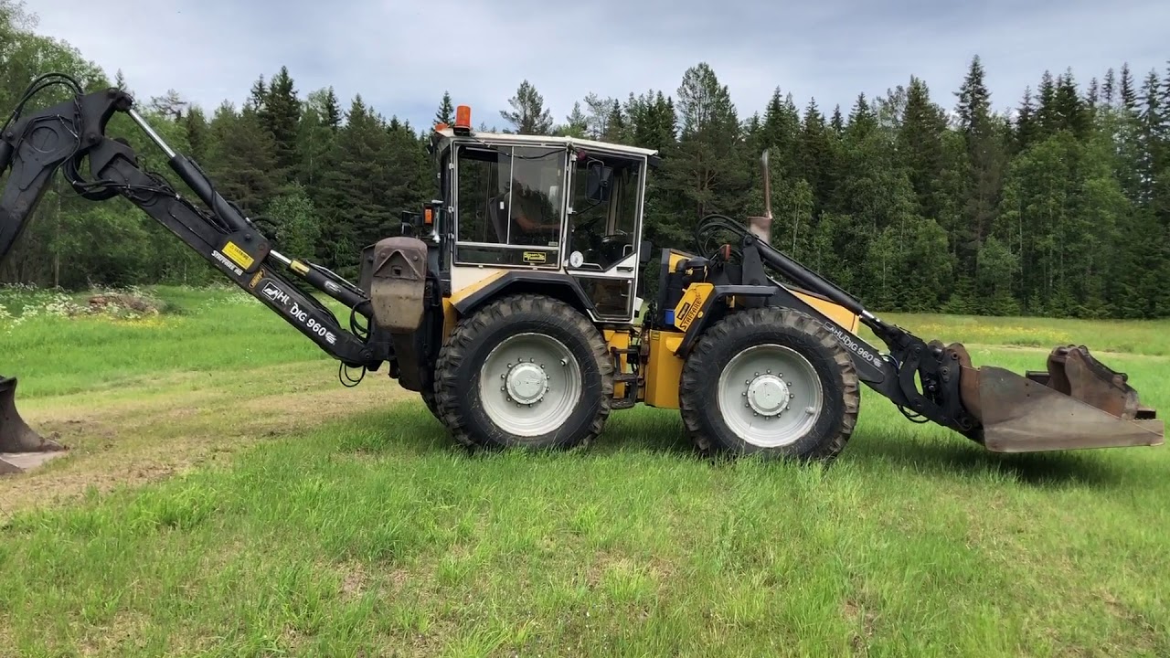Köp traktorgrävare HUDDIG 960 på Klaravik se - YouTube
