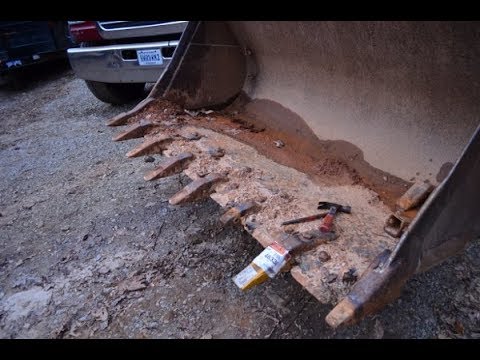 Replacing Bucket Teeth on my Cat 941 Traxcavator - YouTube