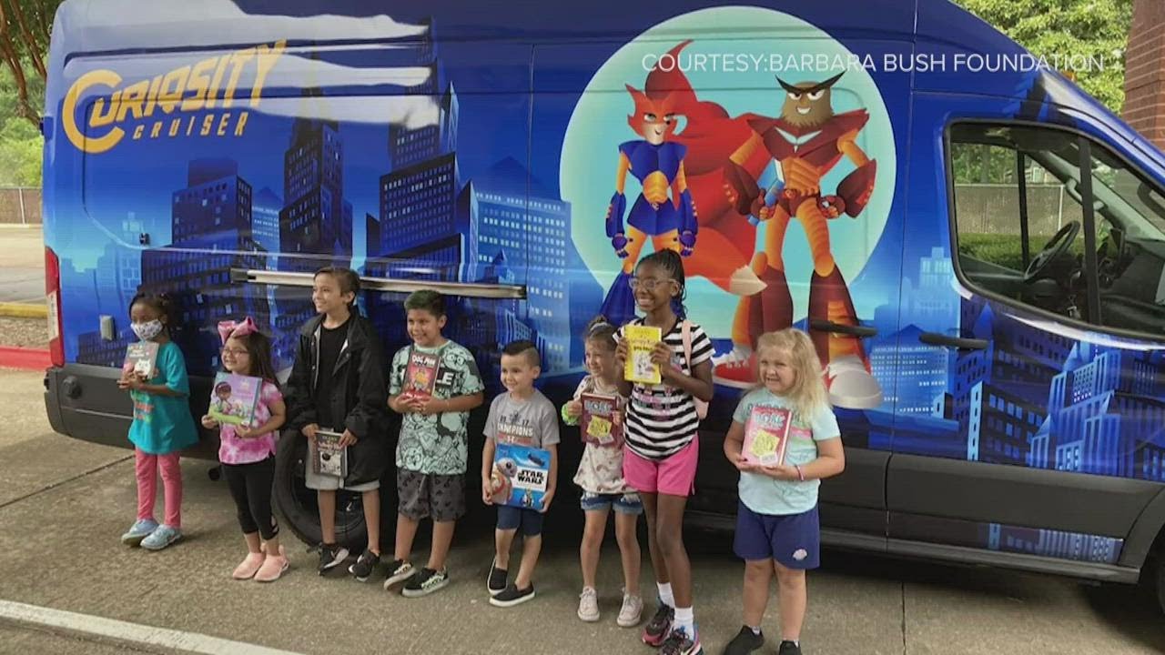 'Curiosity Cruiser' gives away nearly 300 books to elementary students ...