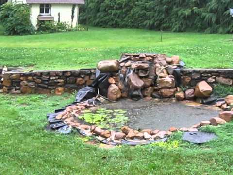Heavy Rain and koi pond with rain harvesting system - YouTube