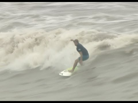World Surfers Ride Waves on Qiantang River's Tidal Bore - YouTube