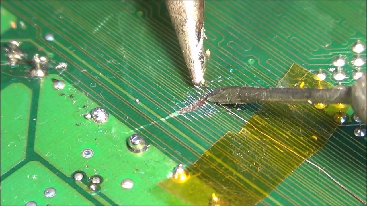 Motherboard EP-8RDAEI broken traces repair with a help of capton tape ...