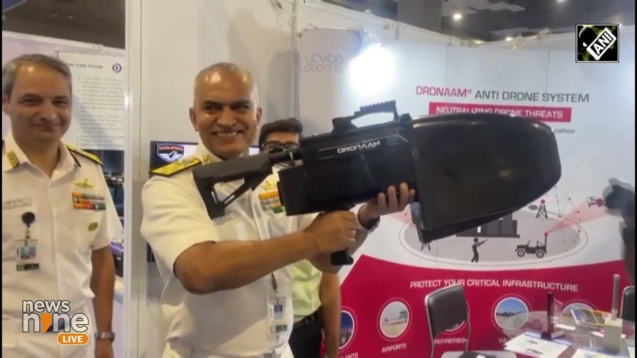 Indian Navy Chief Admiral R Hari Kumar holds the 'Dronaam' counter drone system I News9 - YouTube