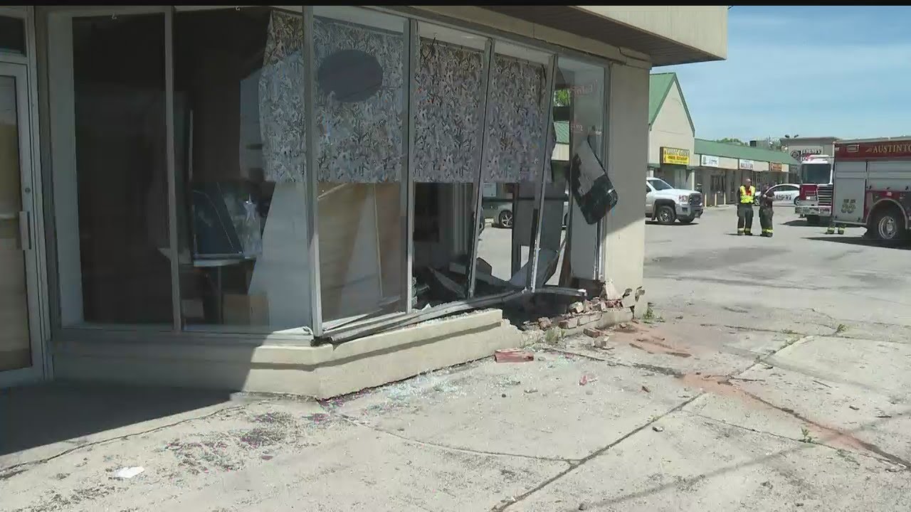 Extensive damage after car crashes into local comic book shop - YouTube