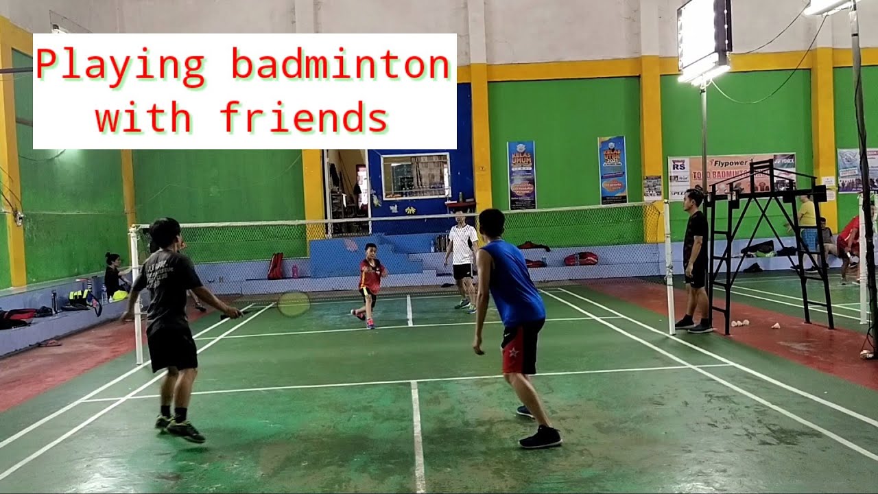 playing badminton with friends indoor court - YouTube