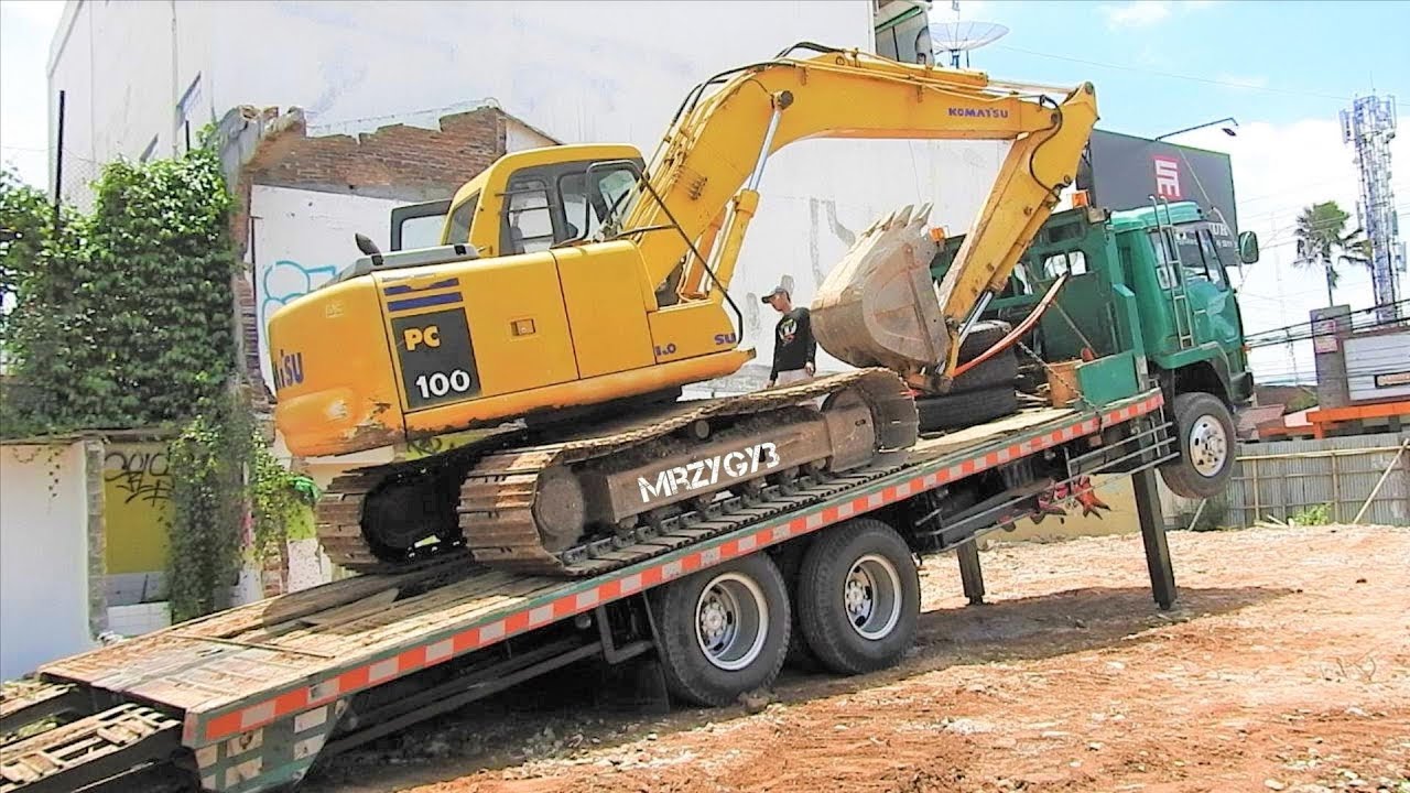 Excavator Transport By Fuso Self Loader Truck Komatsu PC100 - YouTube
