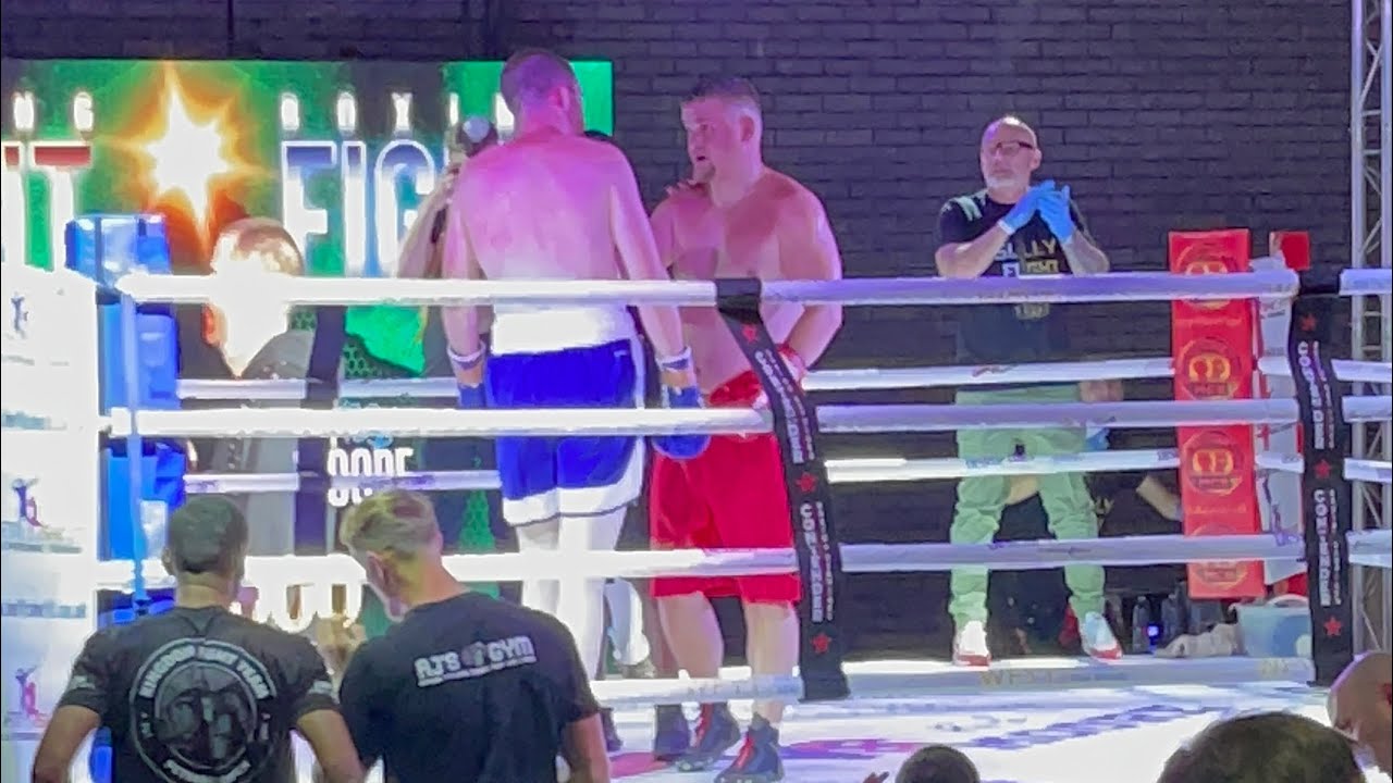 Round 2 of the Charity Boxing fight between Rob Moore and Samuel Leeds ...