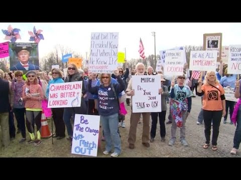 Angry voters confront lawmakers at town halls - YouTube