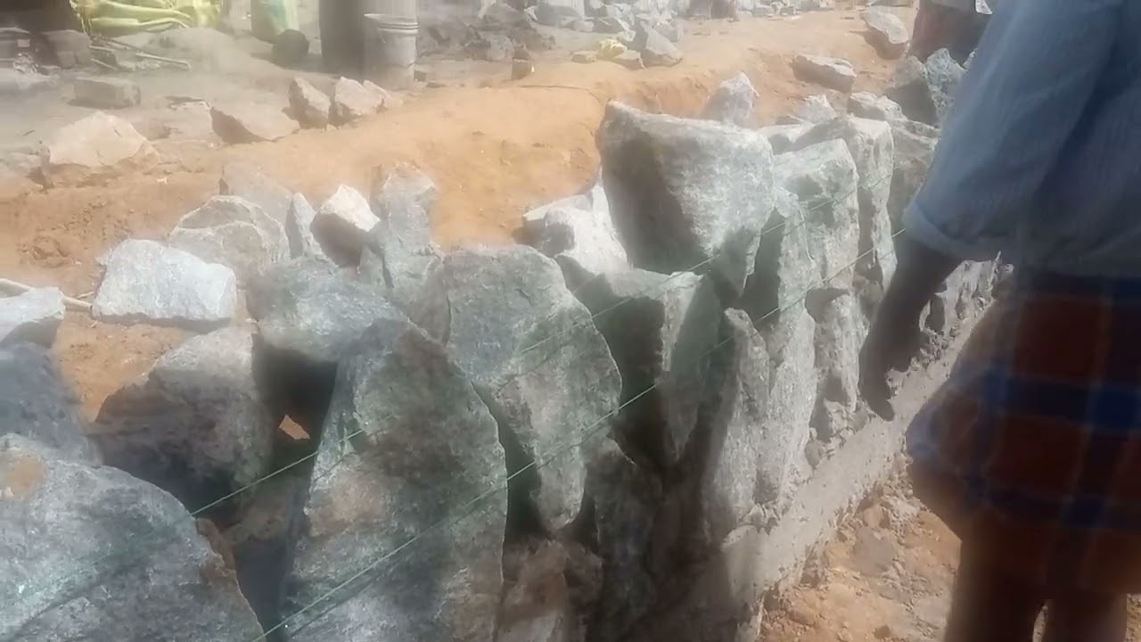 Random rubble(RR masonry) stone masonry work in compound wall - YouTube