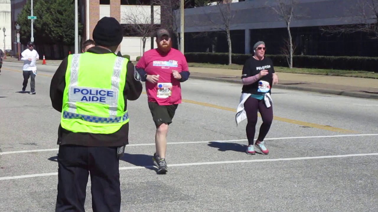 2 Police Aide Encouraging the Runners, One City Marathon, Newport News ...