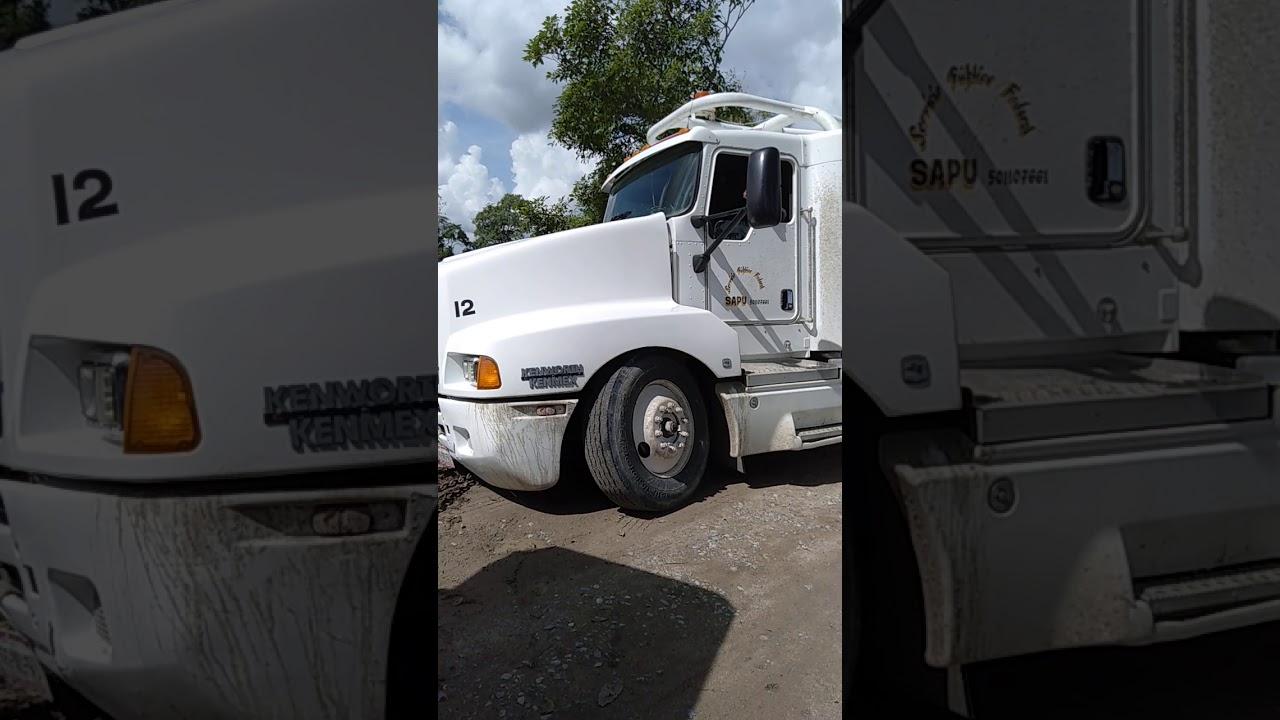 Semi-truck stuck in the mud - YouTube