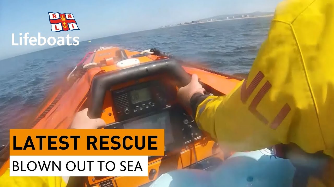 RNLI Rhyl rescue young girl from inflatable - YouTube