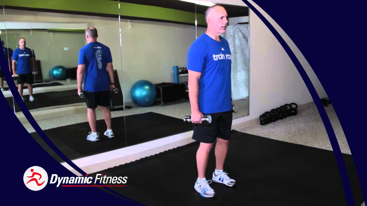 Golf swing stability exercise: DB Rotational-Squat/Posterior Raise ...