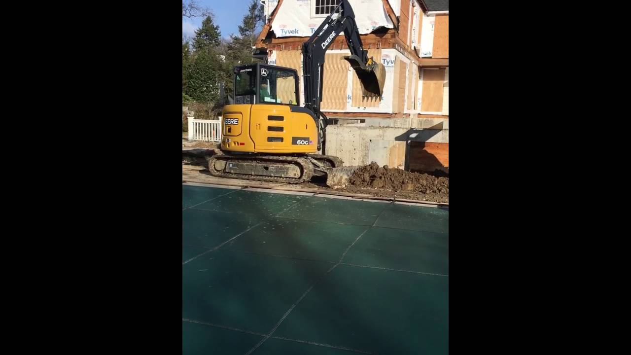 Lasko construction backfilling new foundation john deere and kobelco ...
