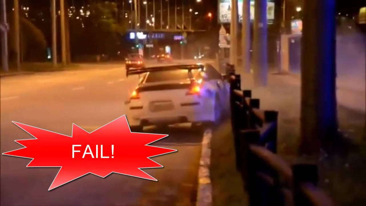 Drifting Car Crashes Into Guard Rail - YouTube