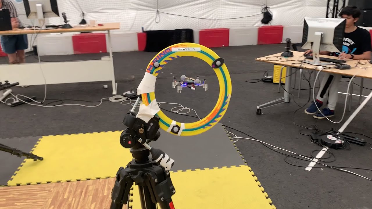 Navigating through hoops using a drone - YouTube