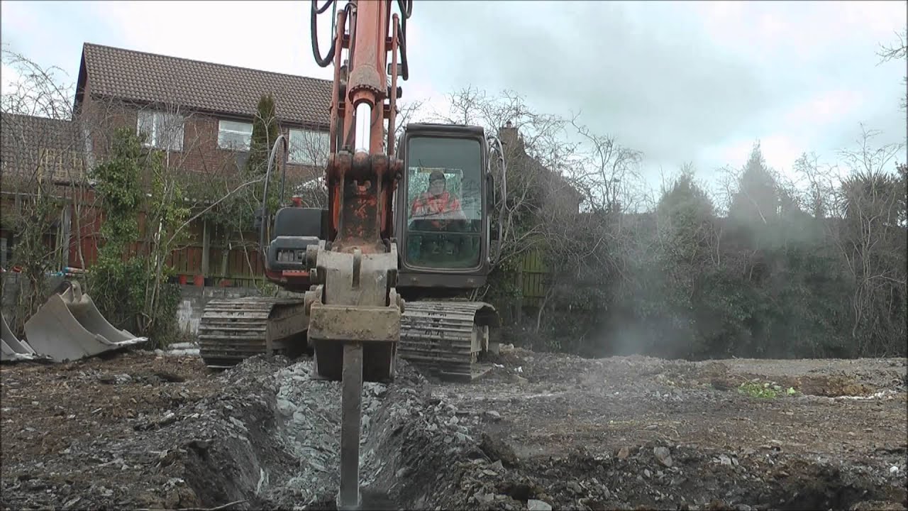 Ripping rock with an excavator - YouTube