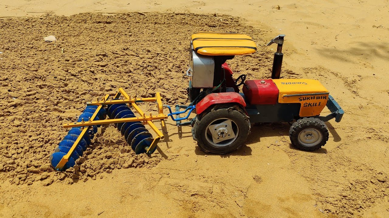 How To Make Mini Tractor And Disc Plow - YouTube