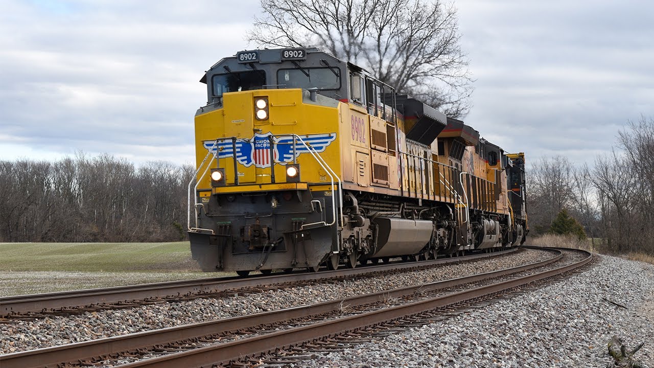 Union Pacific SD70AH 8902 leads NS 110 - YouTube