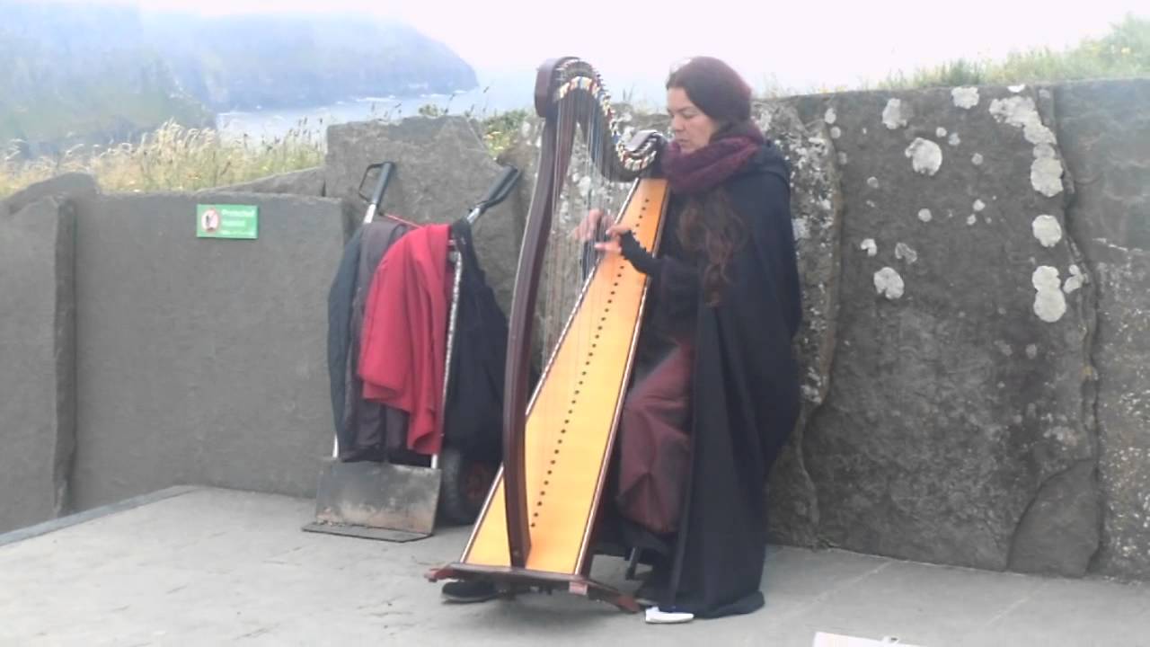 Irish harp player at Cliffs of Moher - YouTube