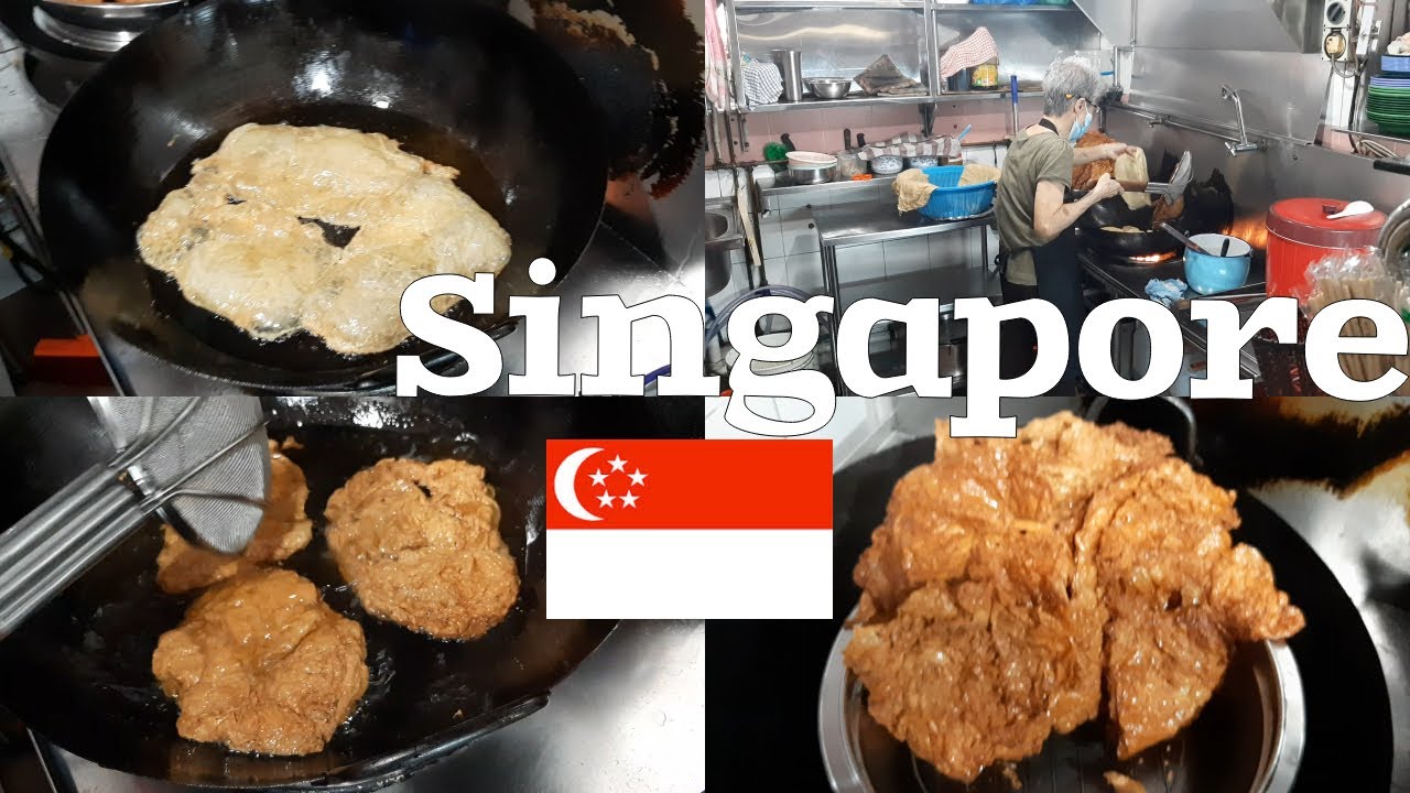 Singapore granny frying Zai Er or 齋鹅 (vegetarian mock goose) in ...