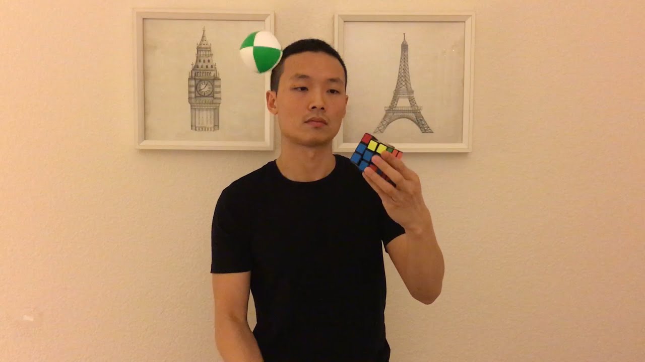 Solving a Rubik's Cube while juggling 2 balls - YouTube