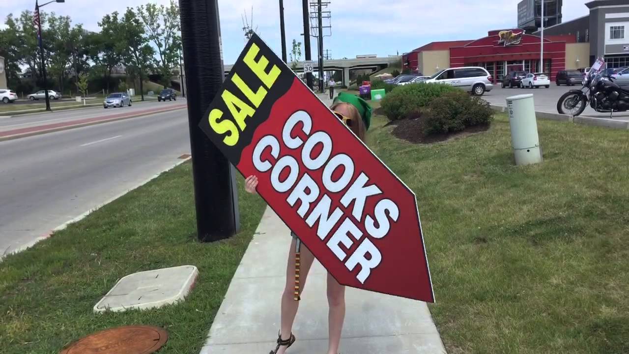 Sign spinning job at Cook's Corner - YouTube