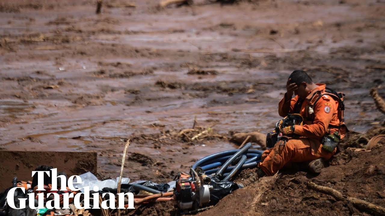 Rescuers sift through toxic mud in search of Brazil dam victims - YouTube