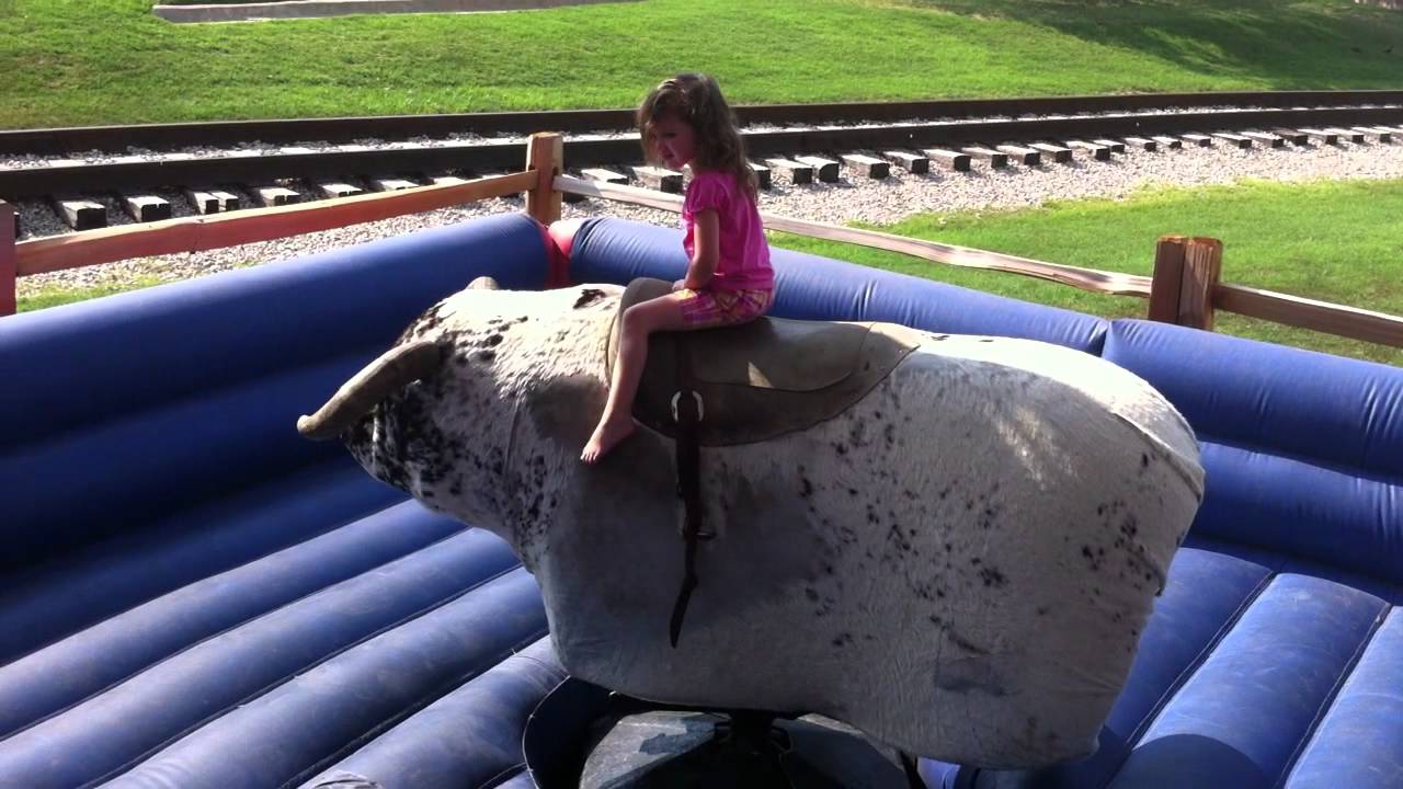Isabelle's first bull ride - YouTube