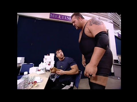 An angry Big Show attacks someone backstage! 10/09/2003