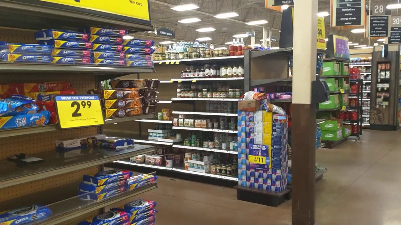 Grocery store shopping with most shelves full or at least some items ...