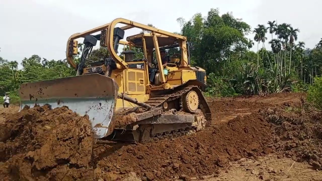 Stockpiling soil in rocky areas to become new rice fields using CAT ...