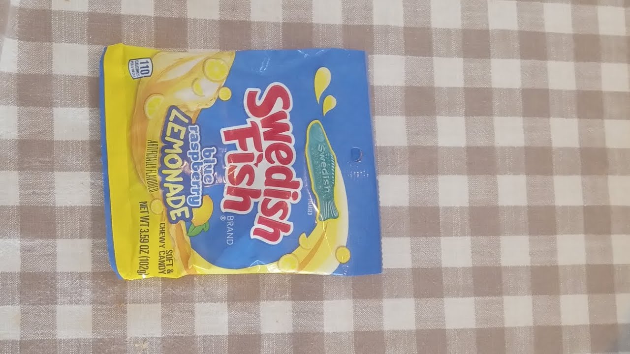 eating swedish fish that's blue raspberry lemon - YouTube