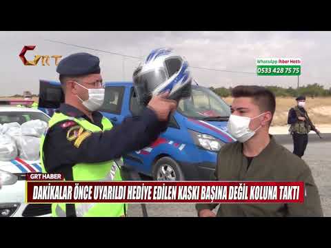 DAKİKALAR ÖNCE UYARILDI HEDİYE EDİLEN KASKI BAŞINA DEĞİL KOLUNA TAKTI