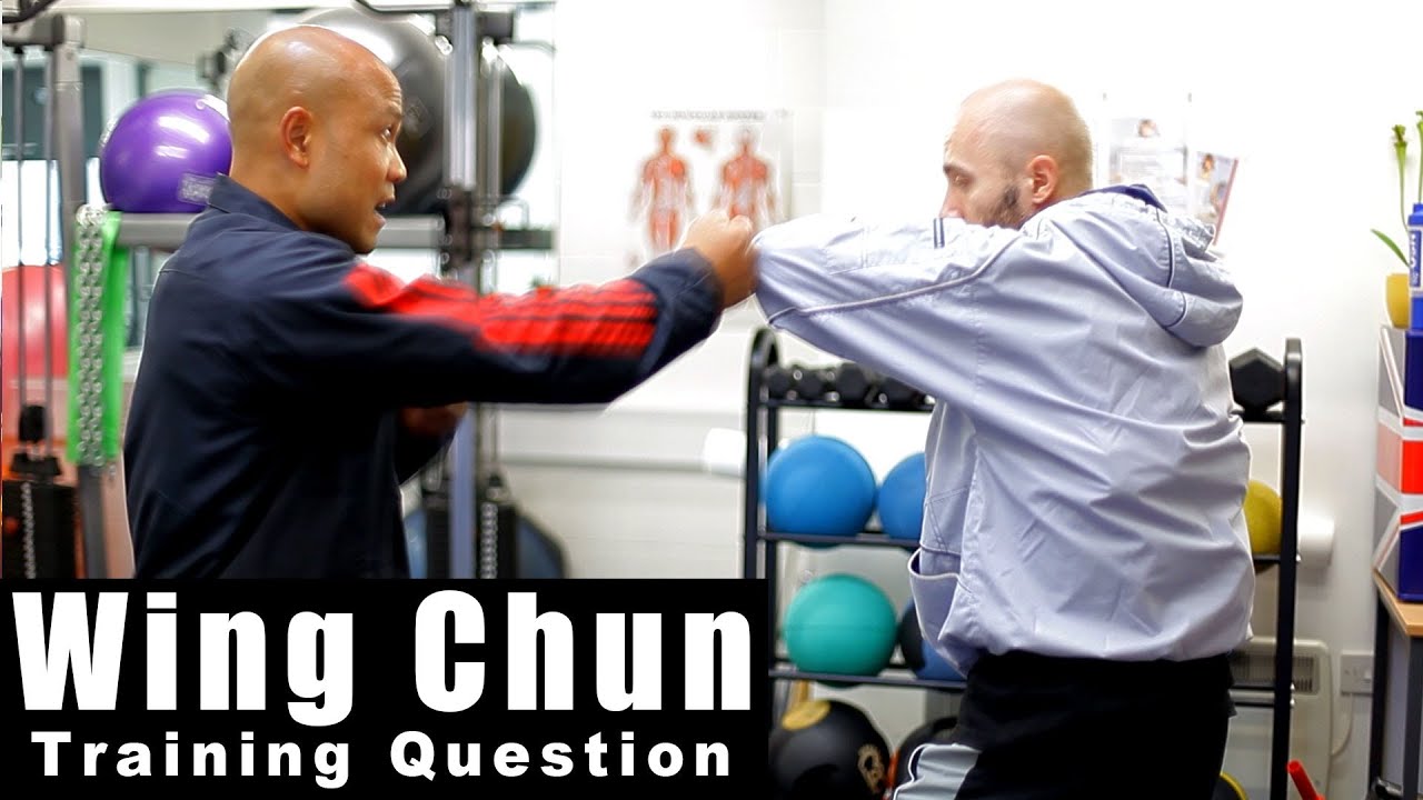 Wing Chun training - wing chun how to deal with the chain punch Q14 ...