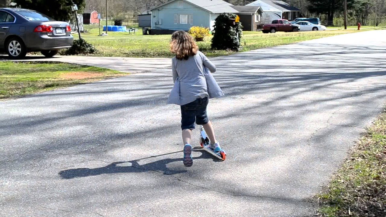 Bri Riding Her Scooter 3-11-12 - YouTube