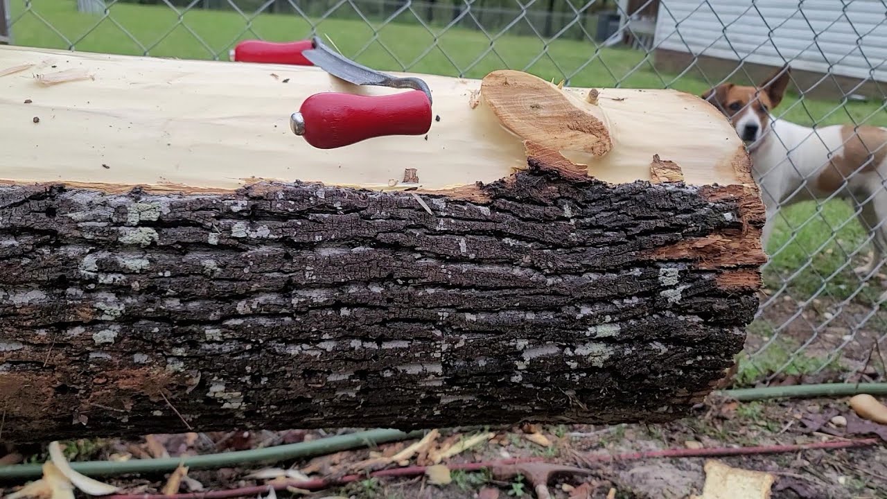 just work, bark removal with drawknife and axe - YouTube