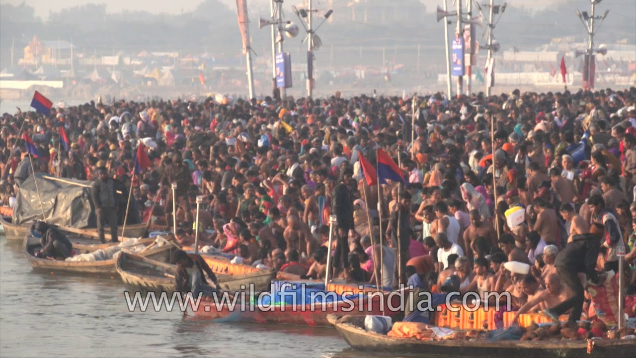 Holy dip in the sacred pitcher of elixir of immortality at Maha Kumbh ...