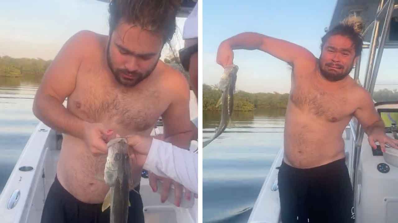 Guy Freaks Out Whilst Holding Fish For Photo - YouTube