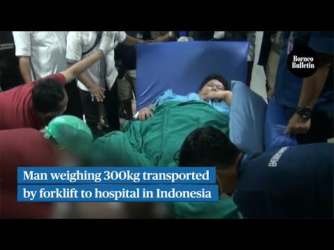 Man weighing 300kg transported by forklift to hospital in Indonesia ...
