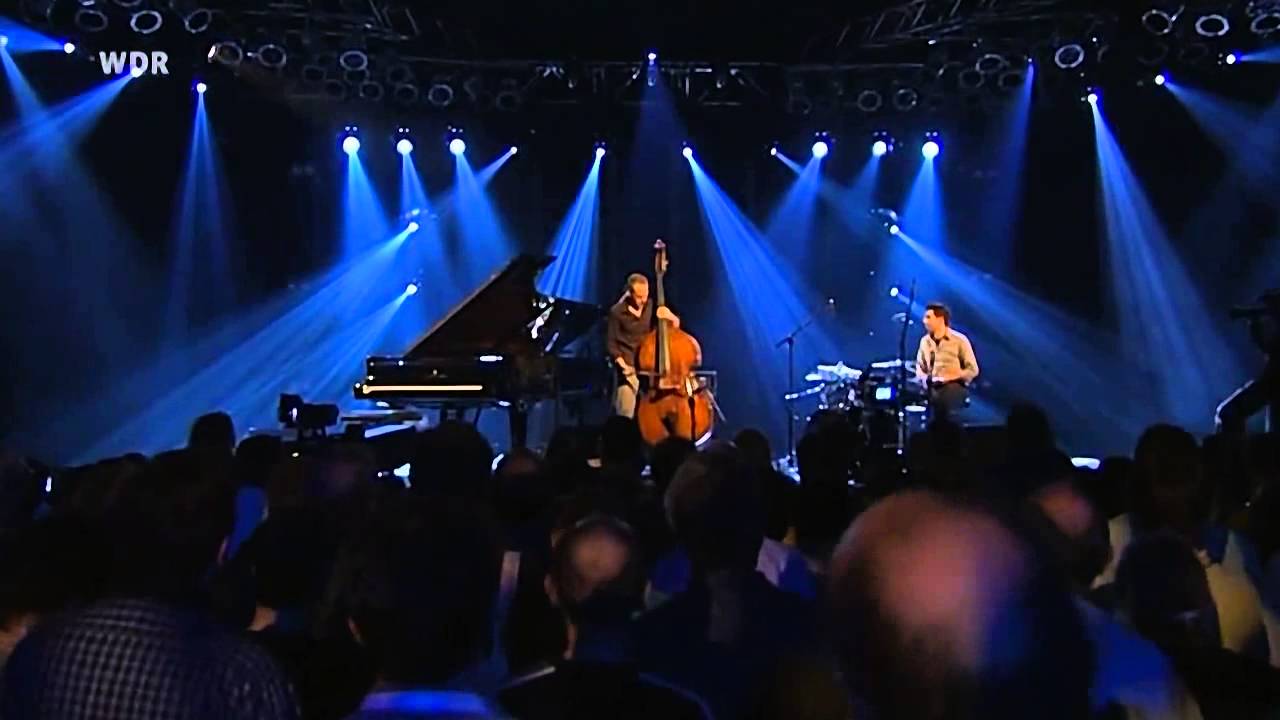 Avishai Cohen Trio's version of "Come Together" - YouTube